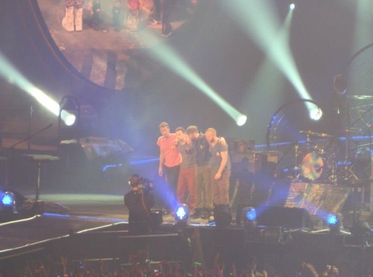 The crowd cheers as Coldplay take their final bow - Coldplay Timeline